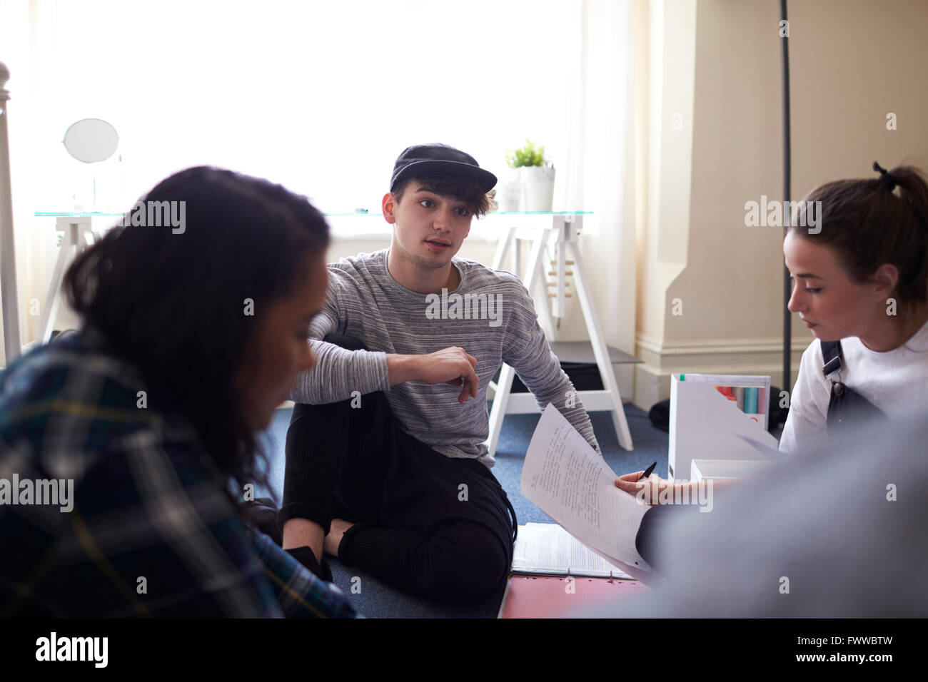 Group Of Students Collaborating On Project Together Stock Photo - Alamy