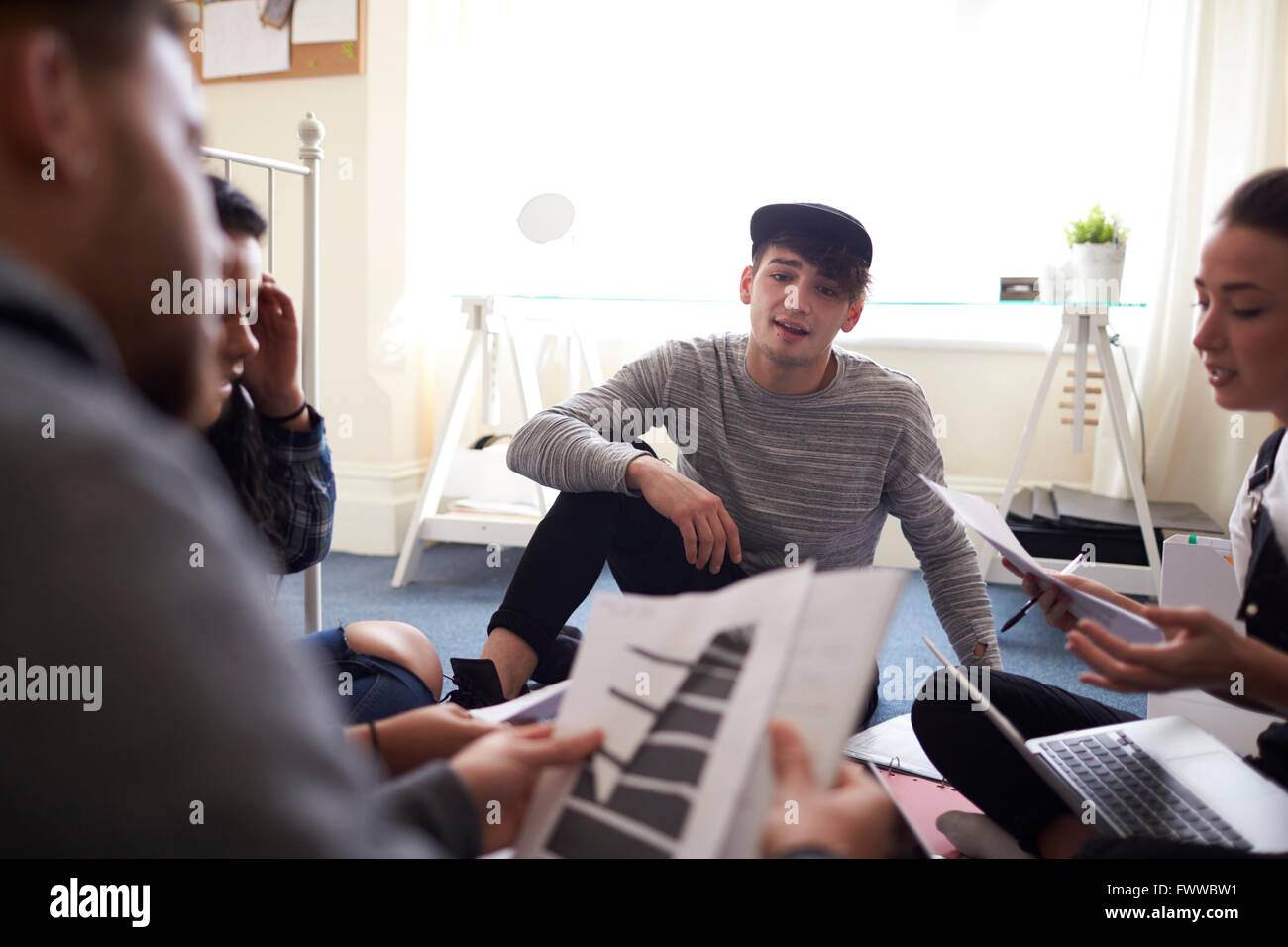 Group Of Students Collaborating On Project Together Stock Photo - Alamy