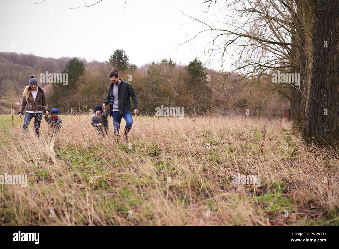 On family walk through winter hi-res stock photography and images - Alamy