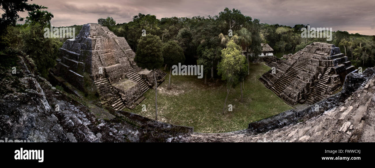 Central America, Guatemala, Yaxha. Classic Mayan pyramid surrounded by ...
