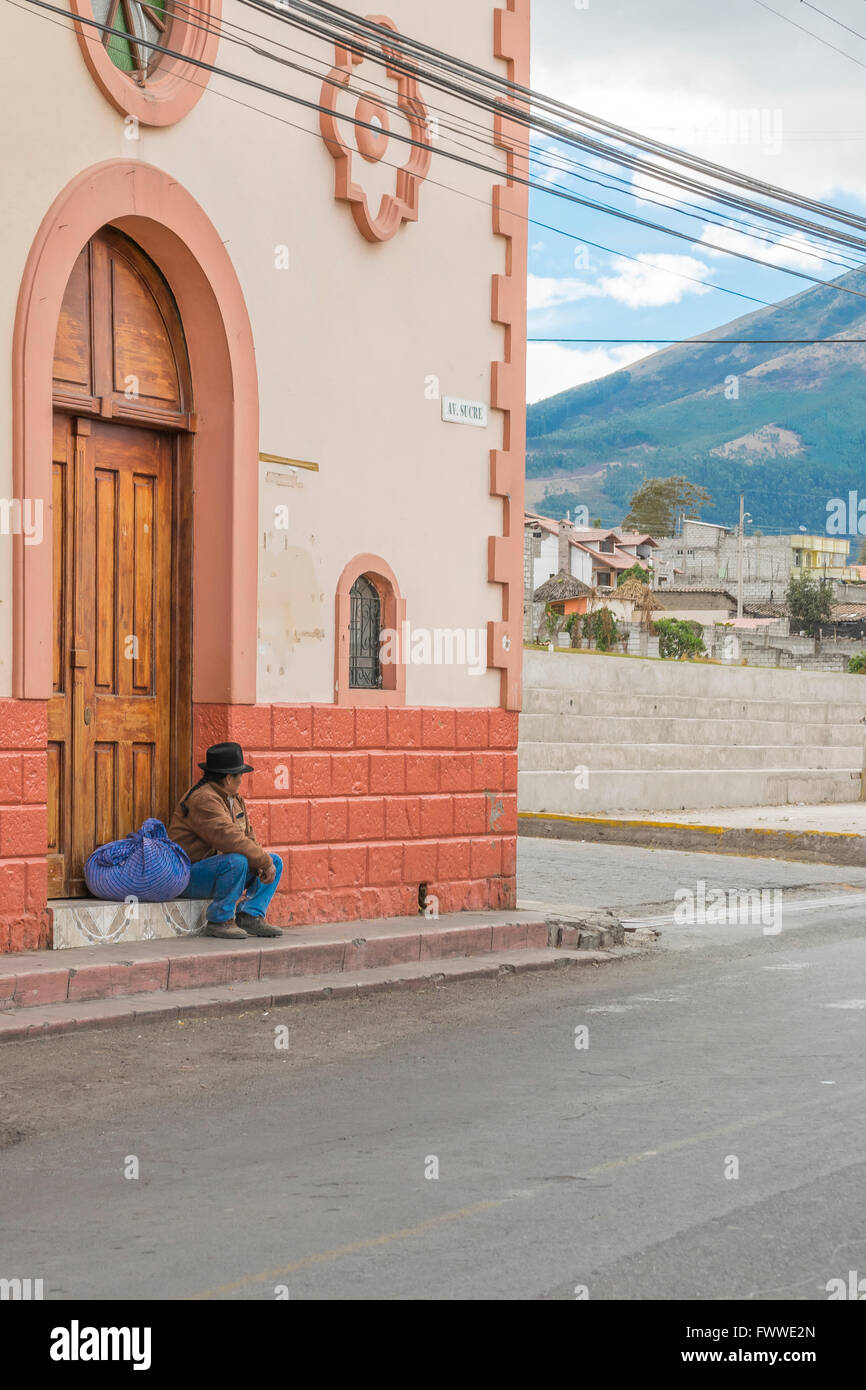 OTAVALO, ECUADOR, OCTOBER - 2015 - Indigenous man sitting on trocal de ...