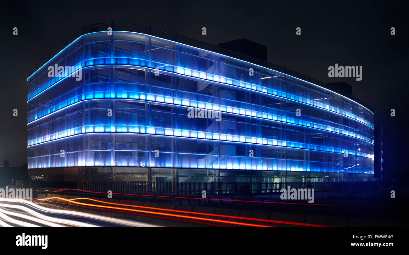 Modern building facade with blue light. Horizontal format Stock Photo ...