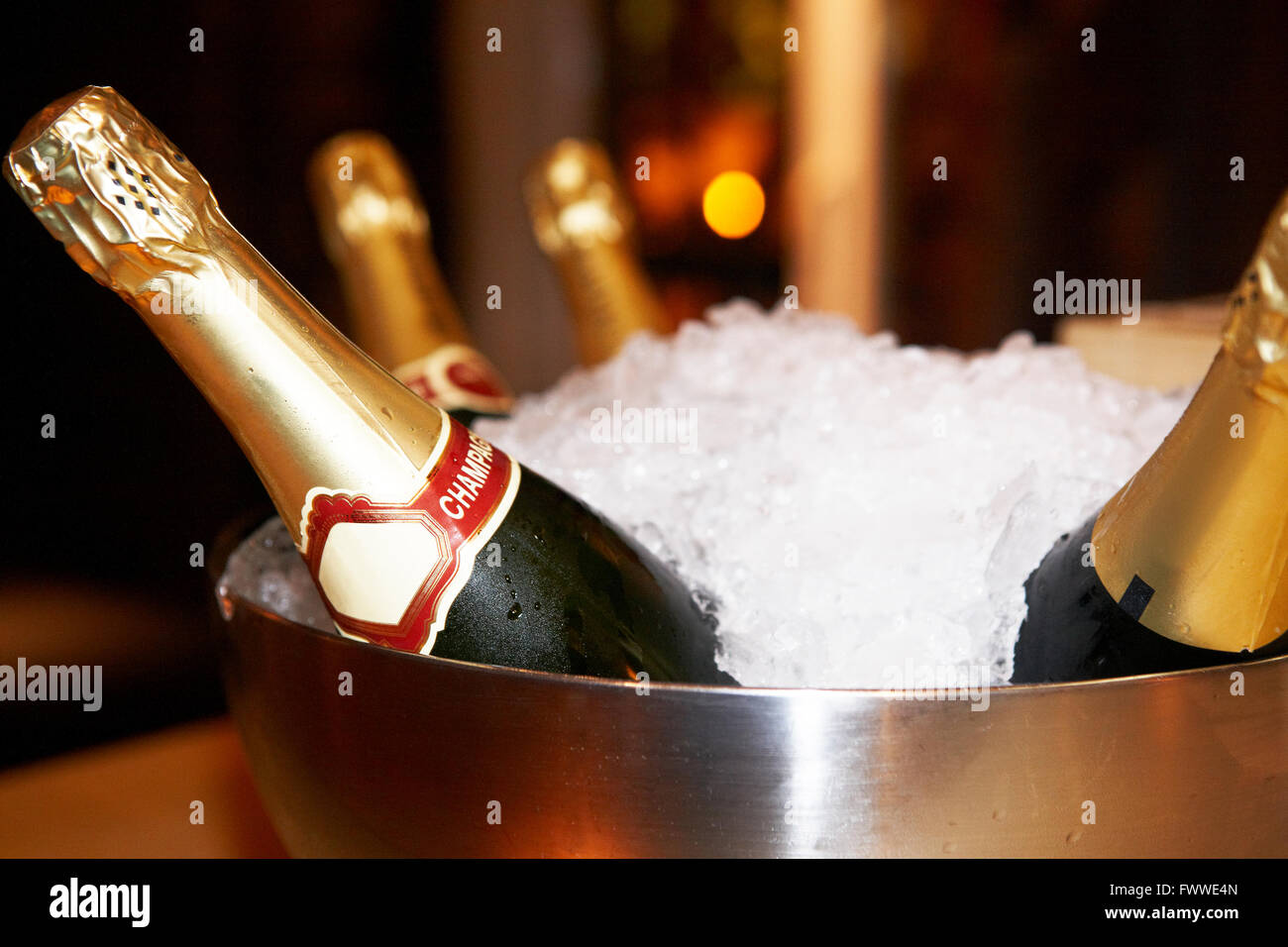 Cup with ice and champagne bottles. Horizontal Stock Photo - Alamy