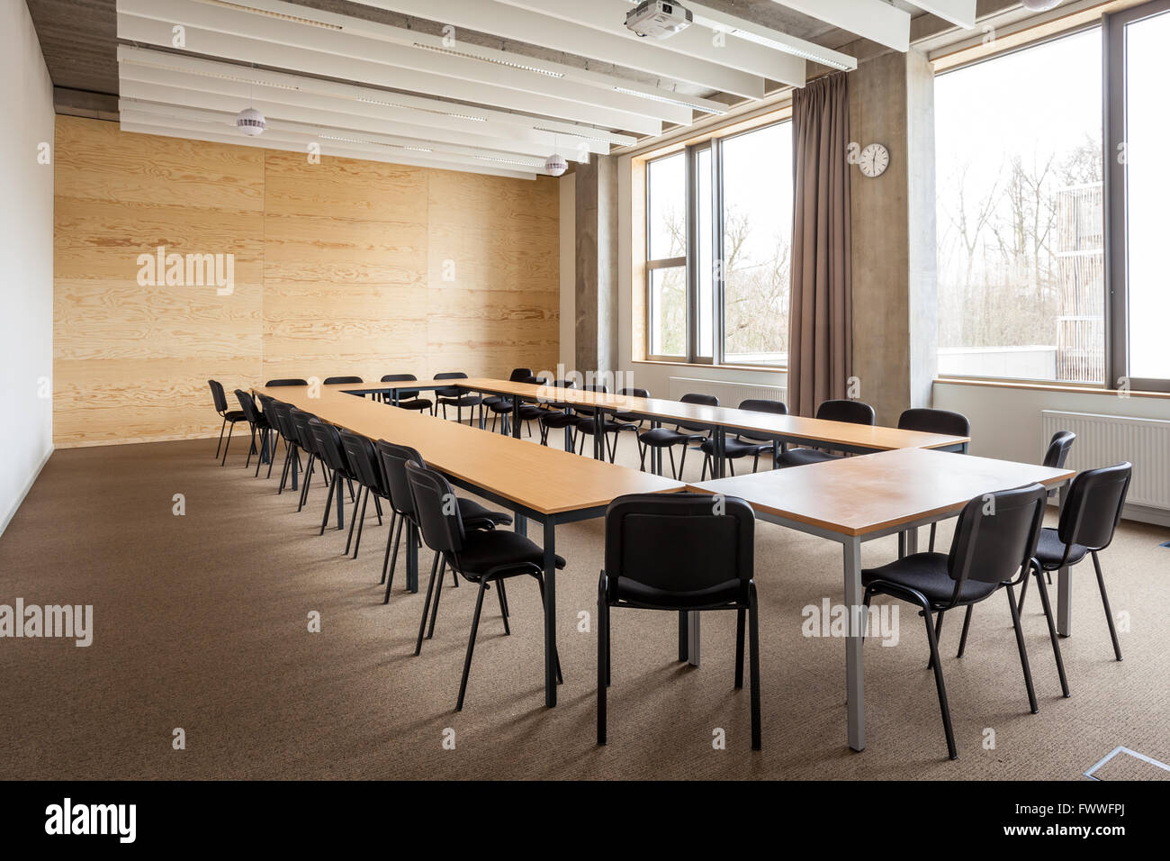 in an new building has an large meeting room Stock Photo - Alamy