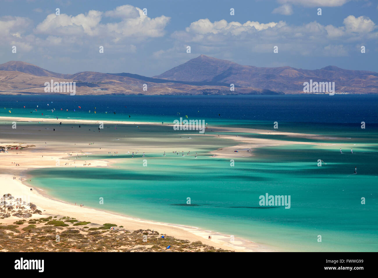 Beach and turquoise sea with windsurfers, Playa Risco del Paso, Playa ...