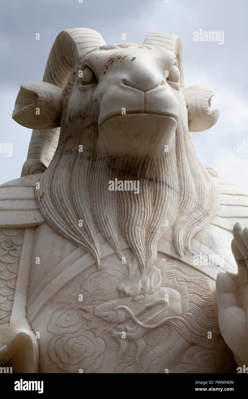 Aries ram statue zodiac head and chest against gray clouds Stock Photo ...