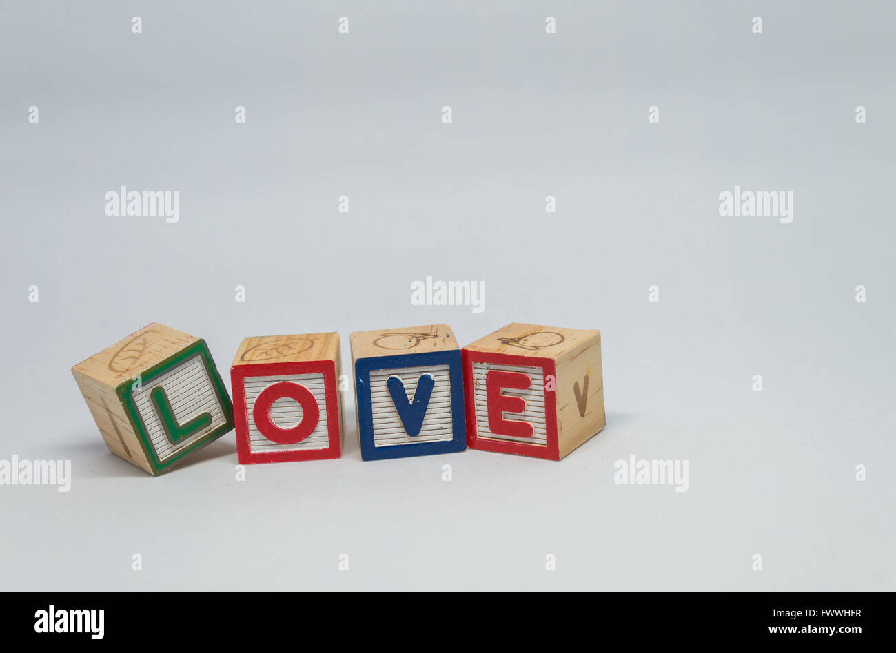 Wooden block LOVE word with white background 2 Stock Photo - Alamy