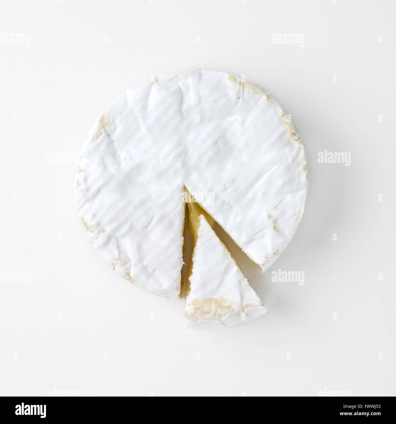 slice camembert cheese isolated on white Stock Photo - Alamy