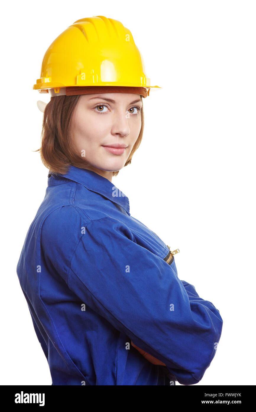 Female builder with blue boiler suit and yellow safety hardhat Stock ...