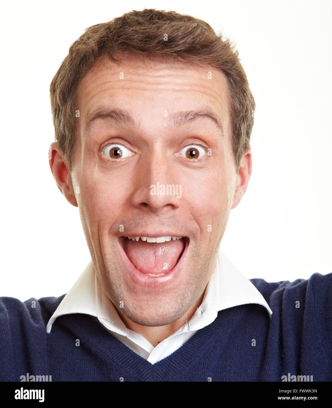 Cheering happy man looking really happy into the camera Stock Photo - Alamy
