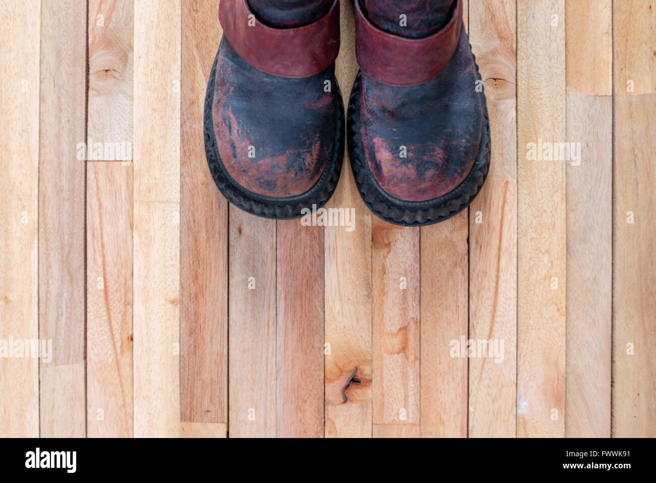 vintage boot on top of grunge wooden Stock Photo - Alamy