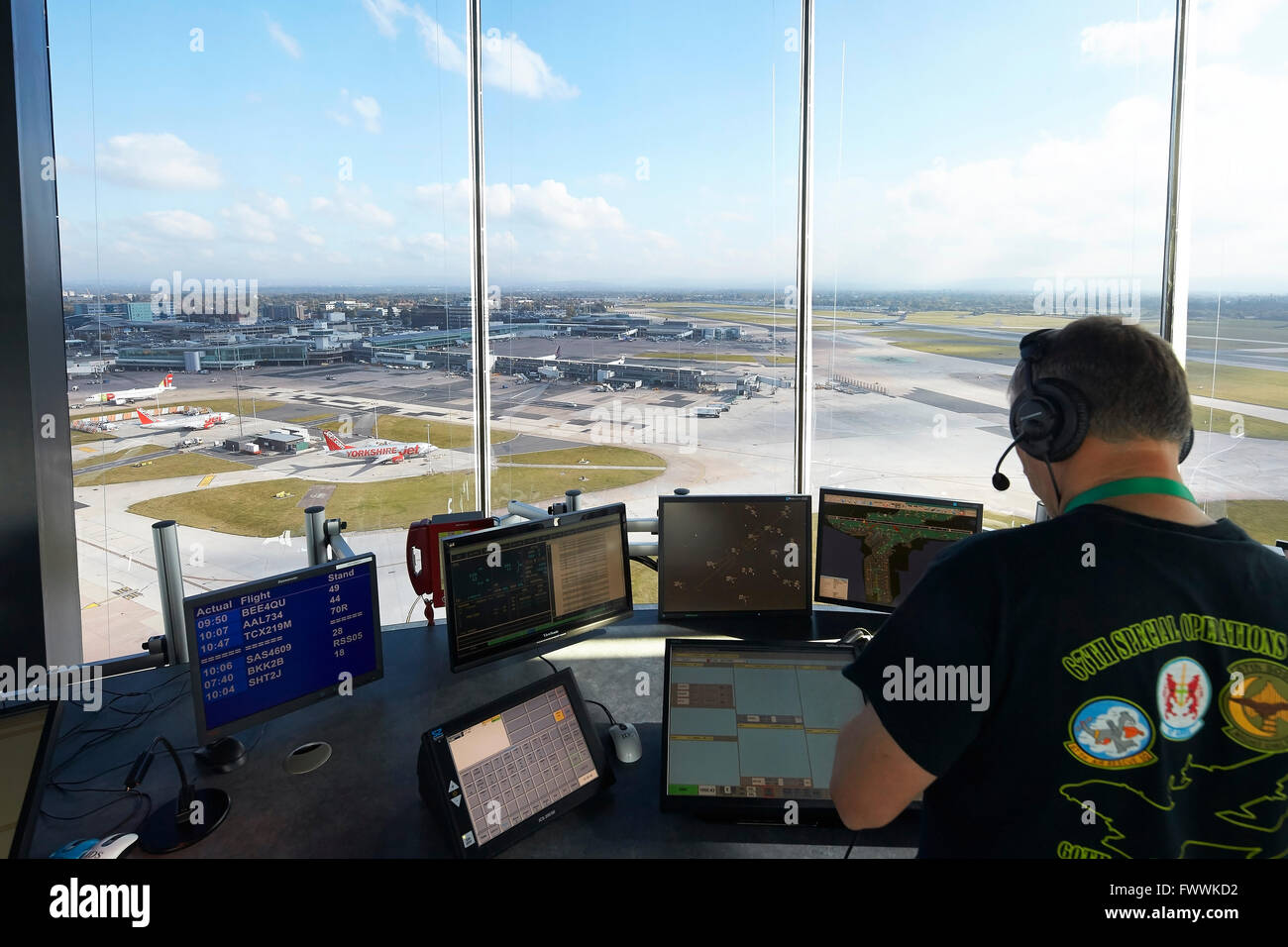 Detail of airport control tower with air controller. Manchester Airport ...