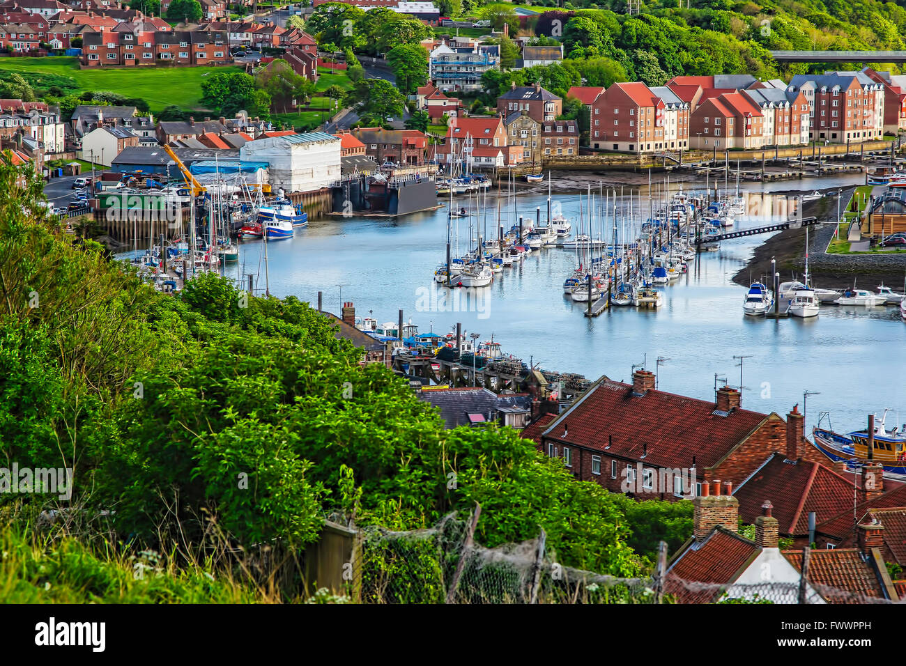 Ships in Whitby coastal line in North Yorkshire in England. Whitby is a ...