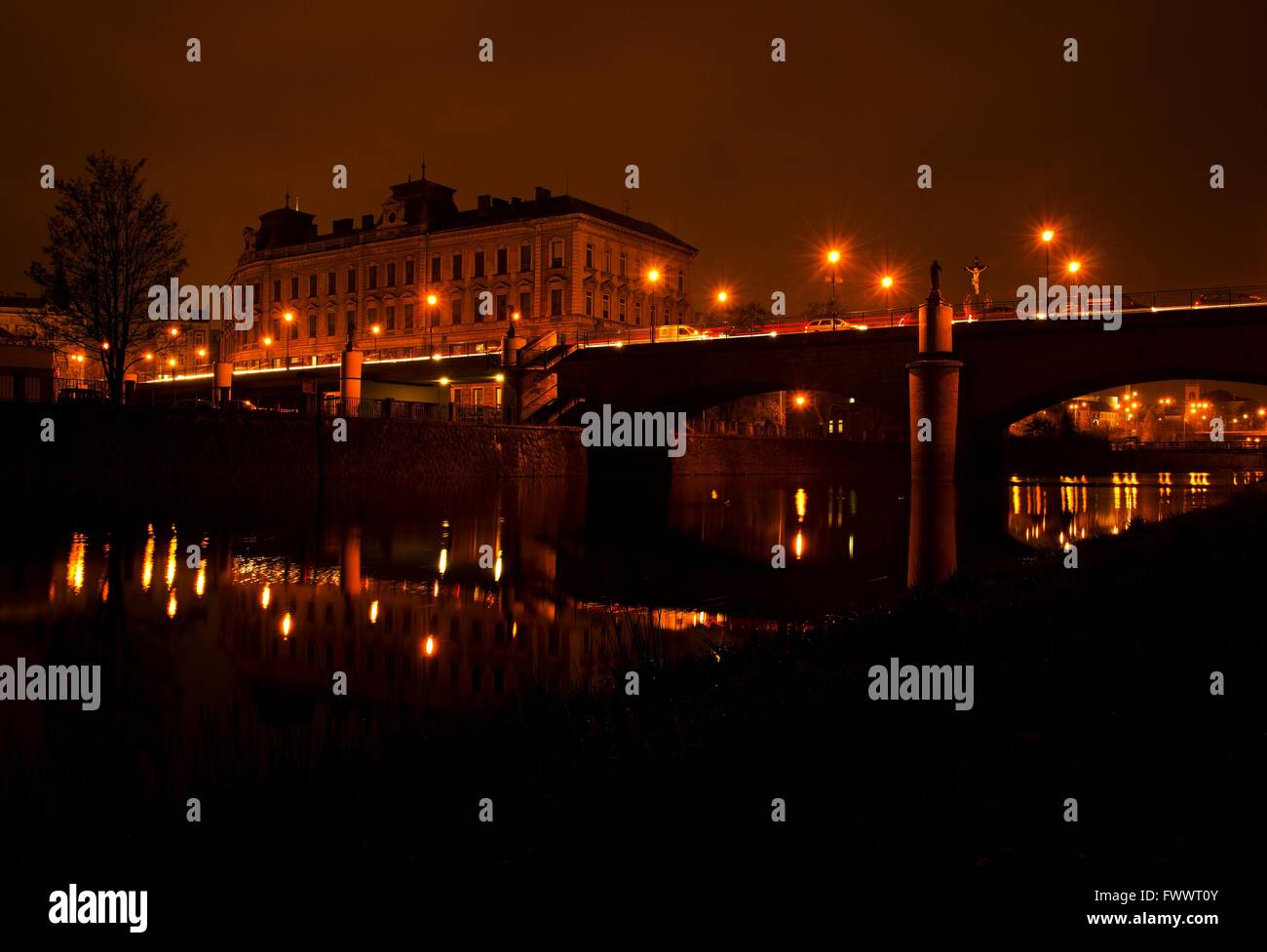 Old traditional arch bridge in the dark Stock Photo - Alamy
