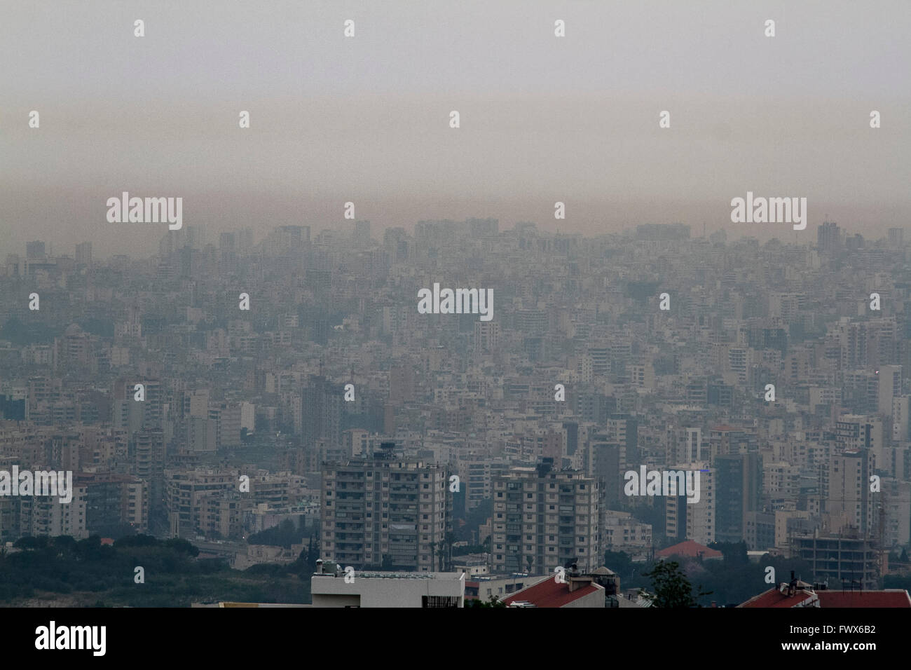 Beirut,Lebanon. 8th April 2016. Beirut skyline chokes under a heavy ...