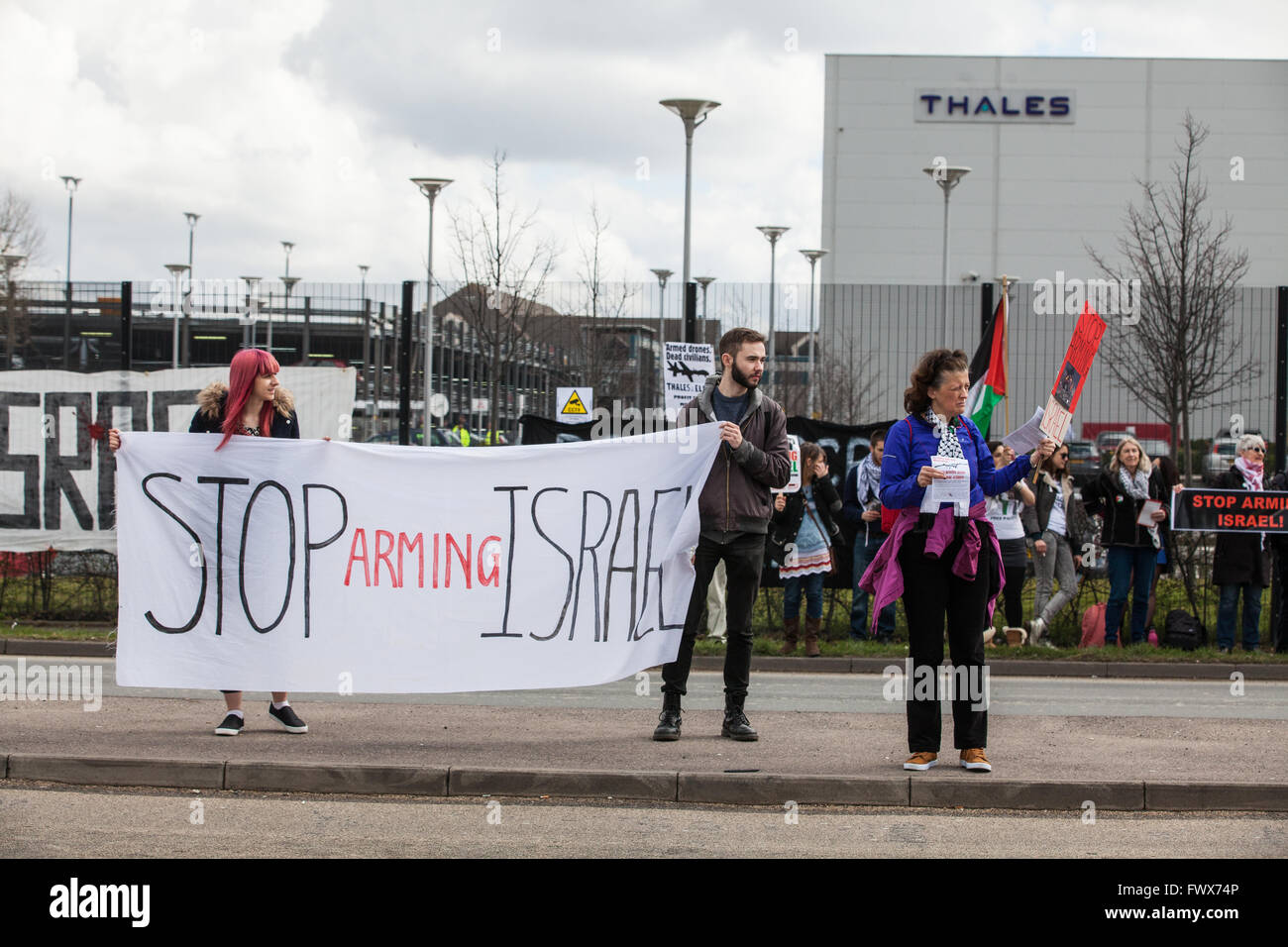 Crawley, UK. 8th April, 2016. Human rights campaigners protest outside ...