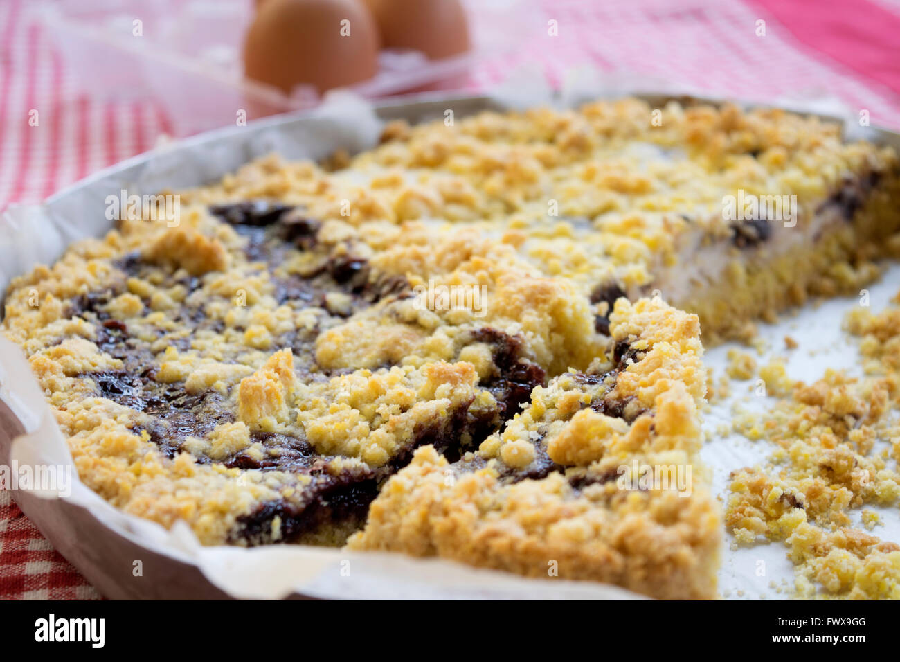 slice of homemade jam crumble tart made with cherries jam Stock Photo ...
