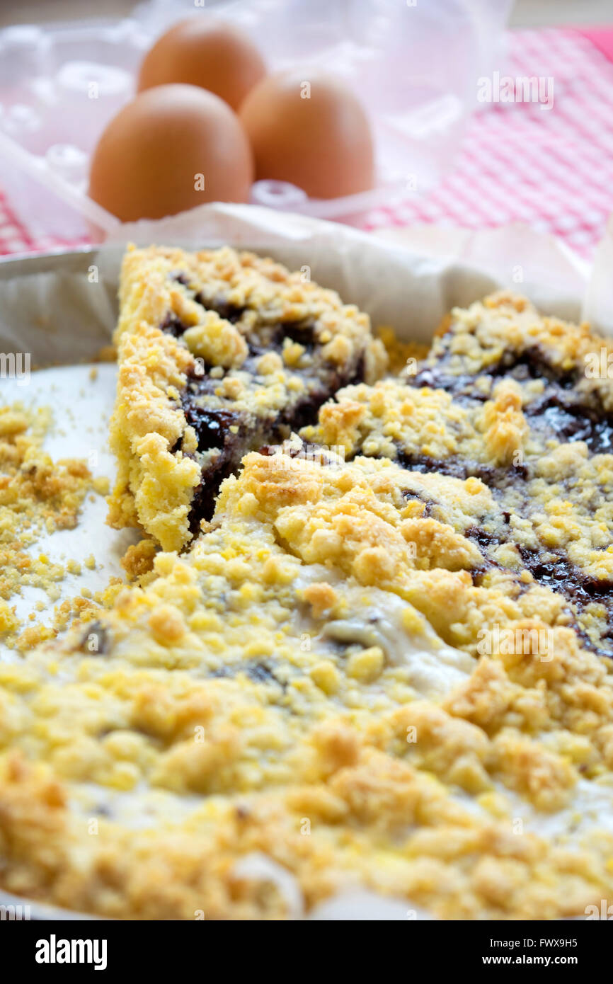 slice of homemade jam crumble tart made with cherries jam Stock Photo ...