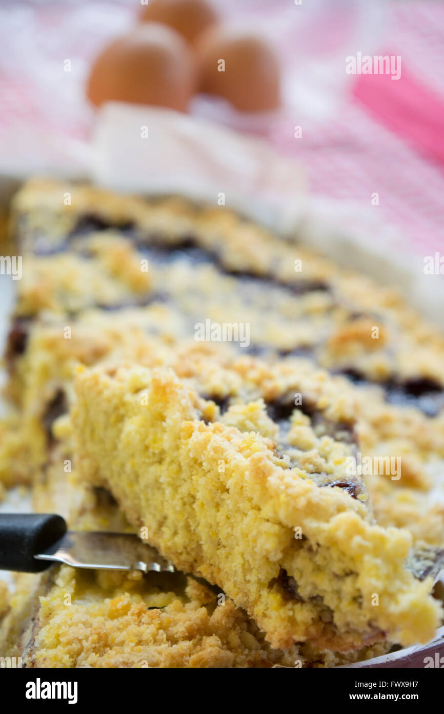 slice of homemade jam crumble tart made with cherries jam Stock Photo ...