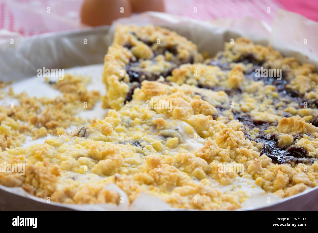 slice of homemade jam crumble tart made with cherries jam Stock Photo ...