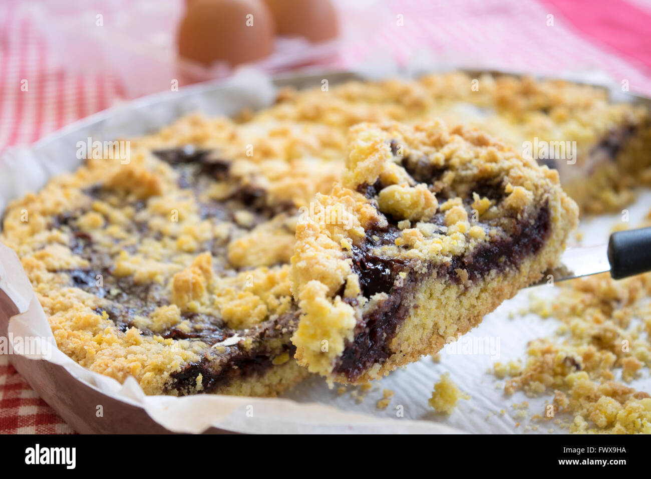 slice of homemade jam crumble tart made with cherries jam Stock Photo ...