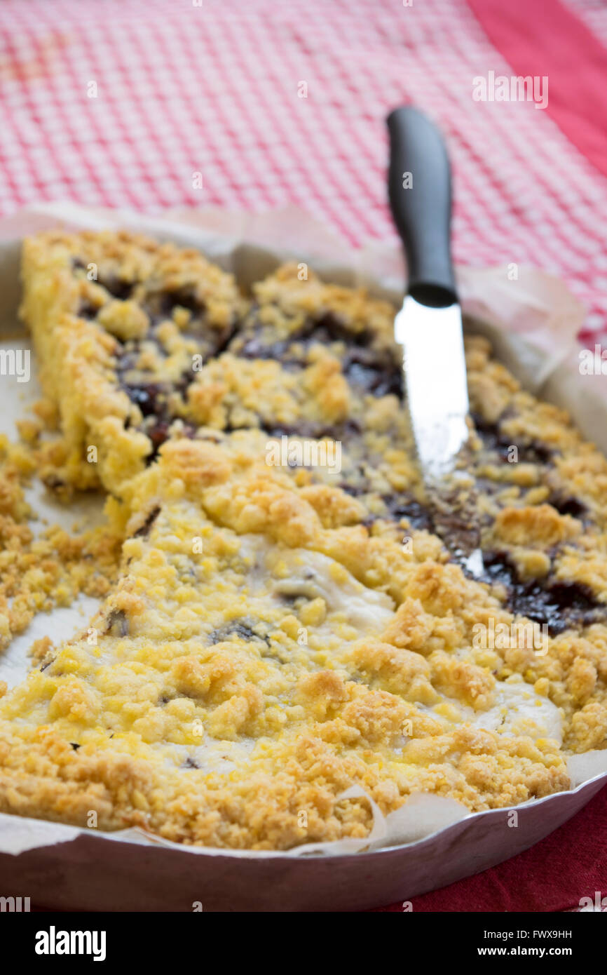 slice of homemade jam crumble tart made with cherries jam Stock Photo ...