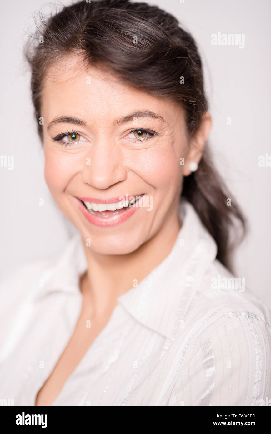 Smiling middle aged woman Stock Photo - Alamy Smiling middle aged woman Stock Photo - Alamy