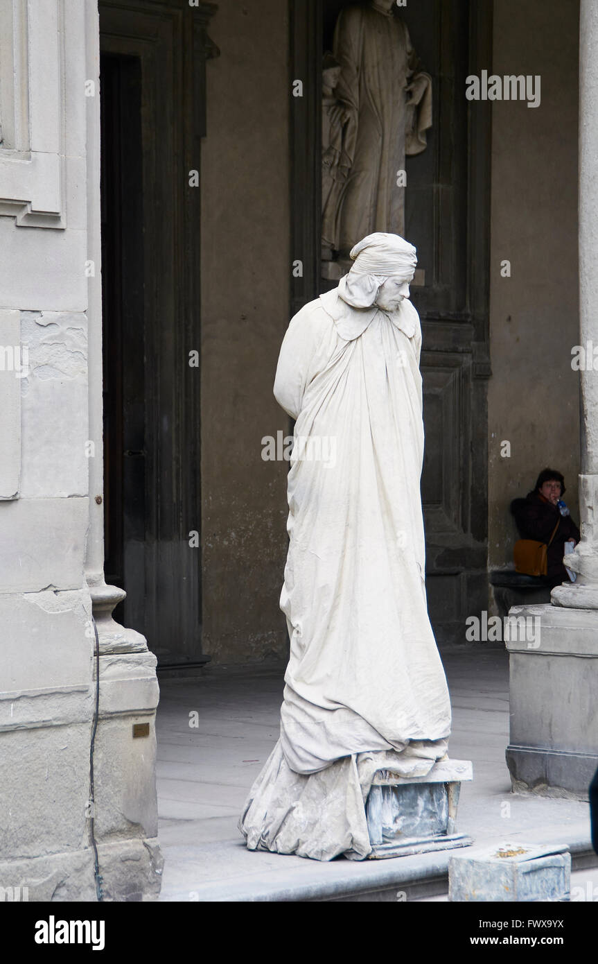 A Human statue simulates the marble of the figures around the Piazzale ...