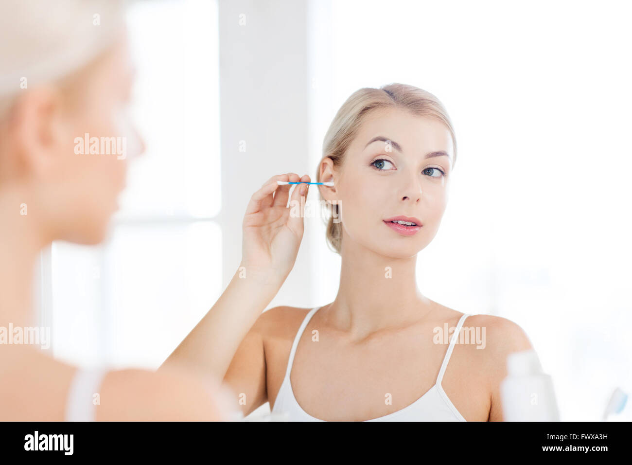 Ear cleaning hi-res stock photography and images - Alamy