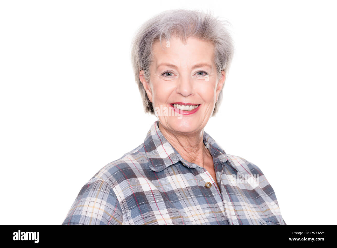 Active senior woman in front of white background Stock Photo - Alamy