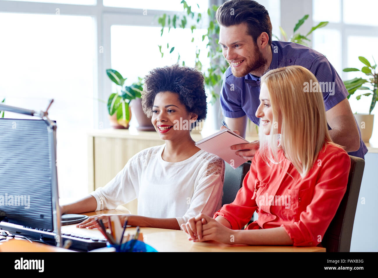 Happy office assistant hi-res stock photography and images - Alamy