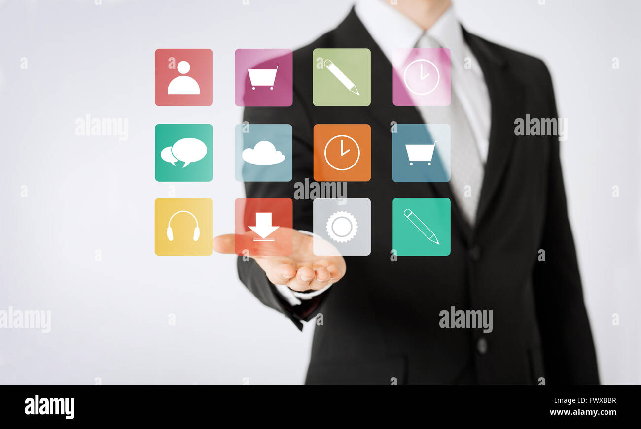 close up of man showing application menu icons Stock Photo - Alamy