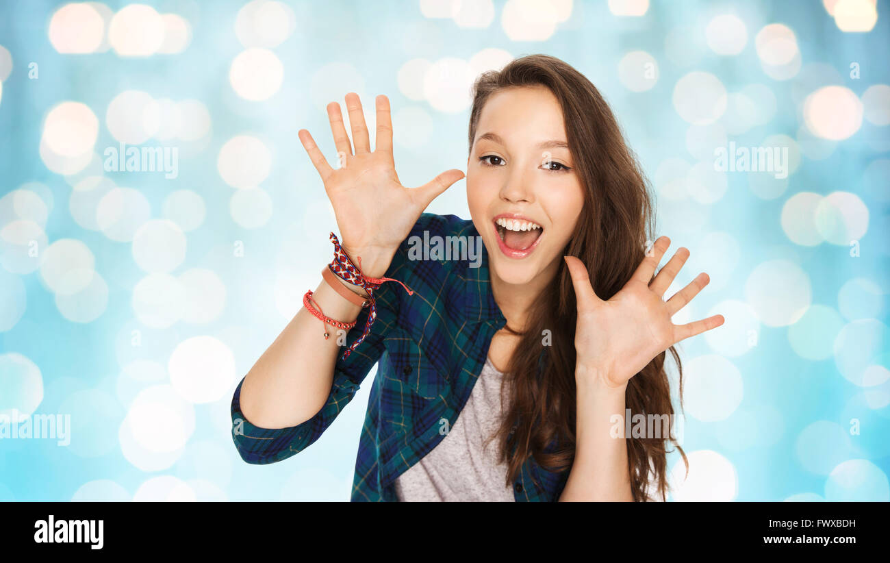 happy laughing pretty teenage girl showing hands Stock Photo - Alamy