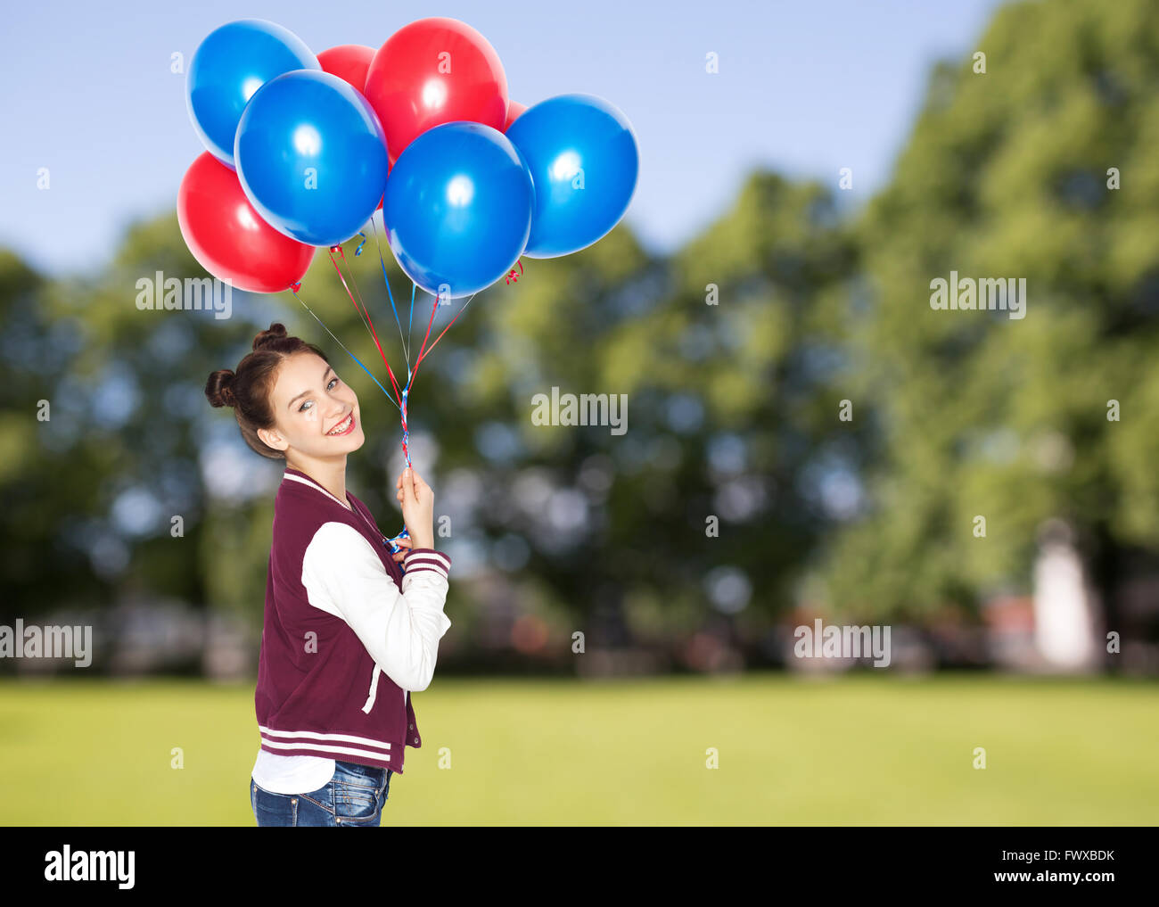 happy teenage girl with helium balloons Stock Photo - Alamy