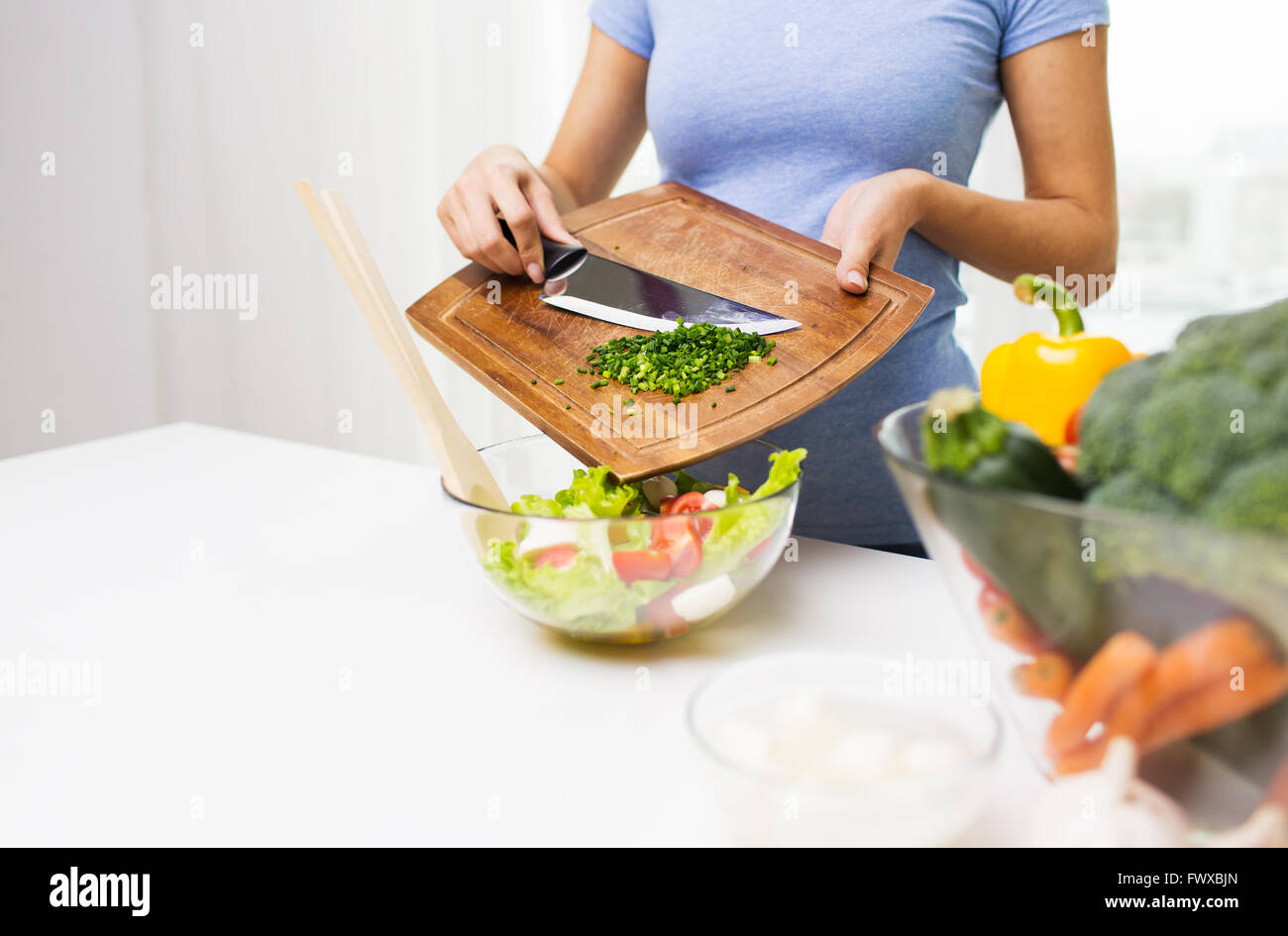 close up of woman with chopped onion cooking salad Stock Photo - Alamy