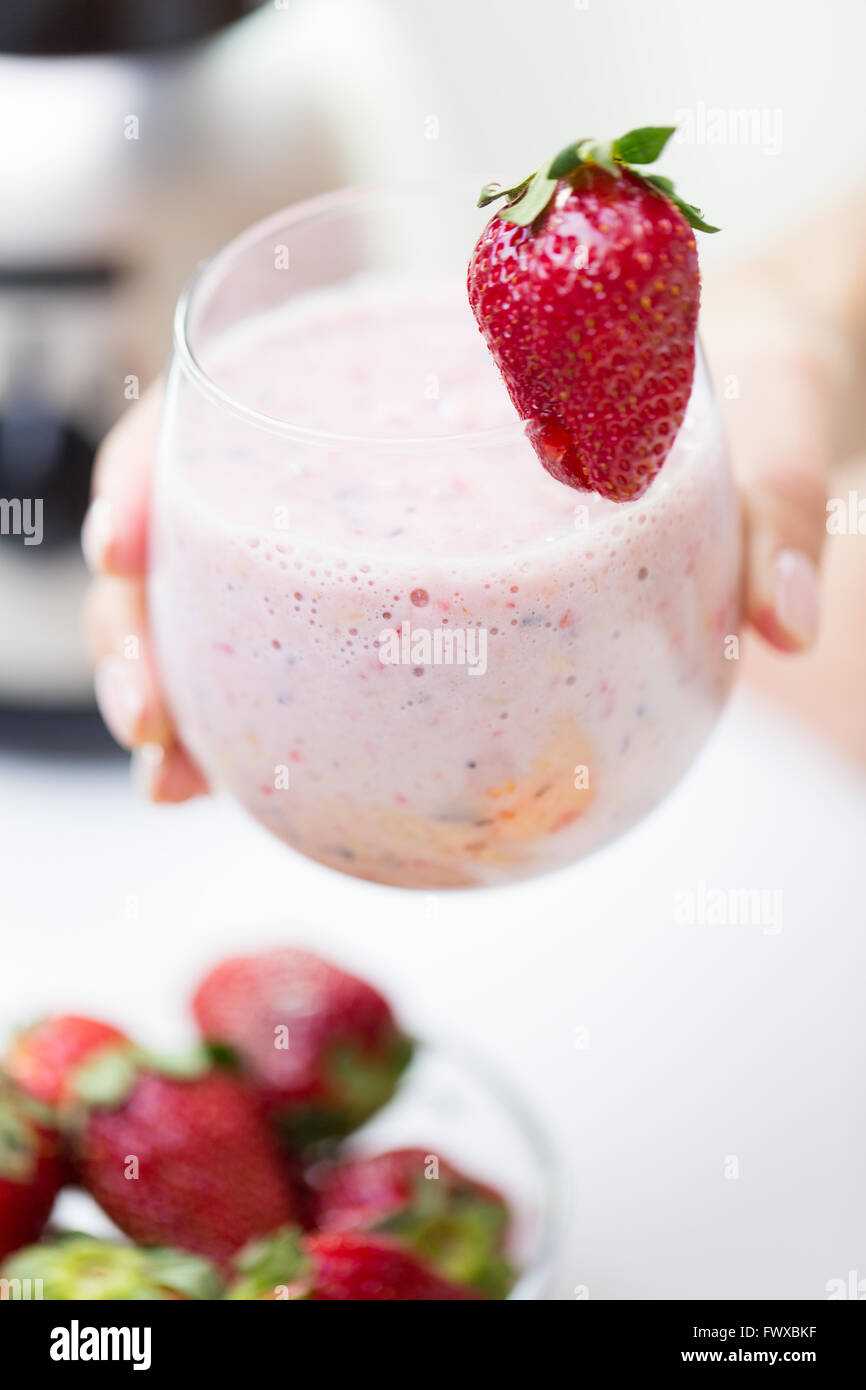 Female hand holding glass organic hi-res stock photography and images ...