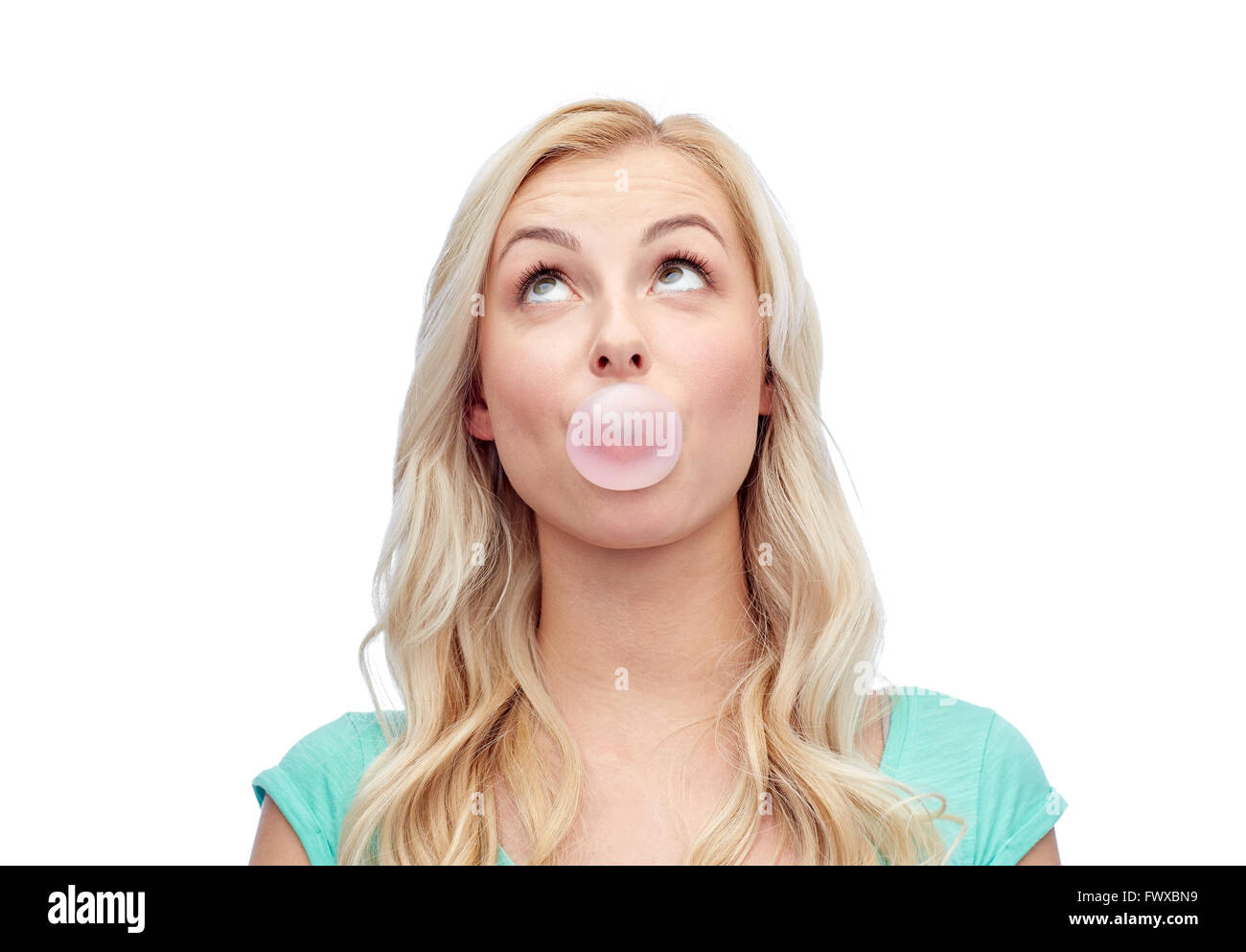 happy young woman or teenage girl chewing gum Stock Photo - Alamy