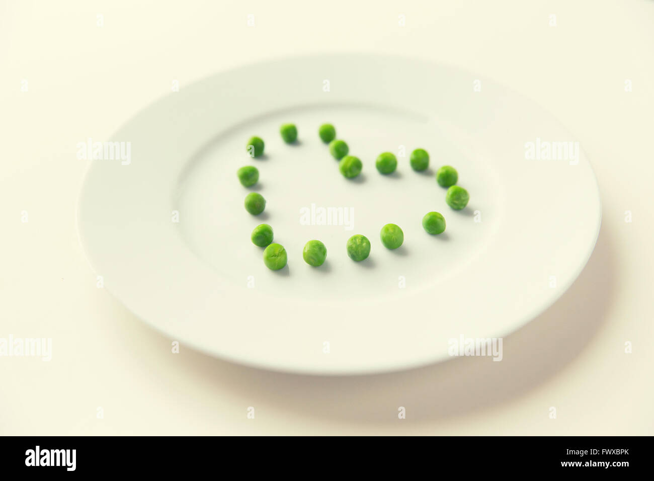 Plate of green peas hi-res stock photography and images - Alamy