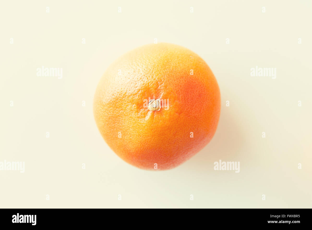 ripe grapefruit over white Stock Photo - Alamy