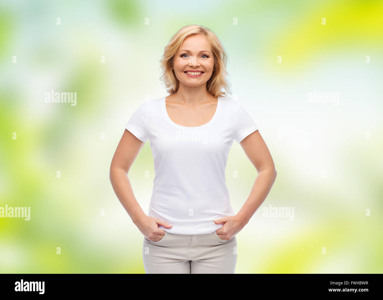 Casual woman in white shirt hi-res stock photography and images - Alamy