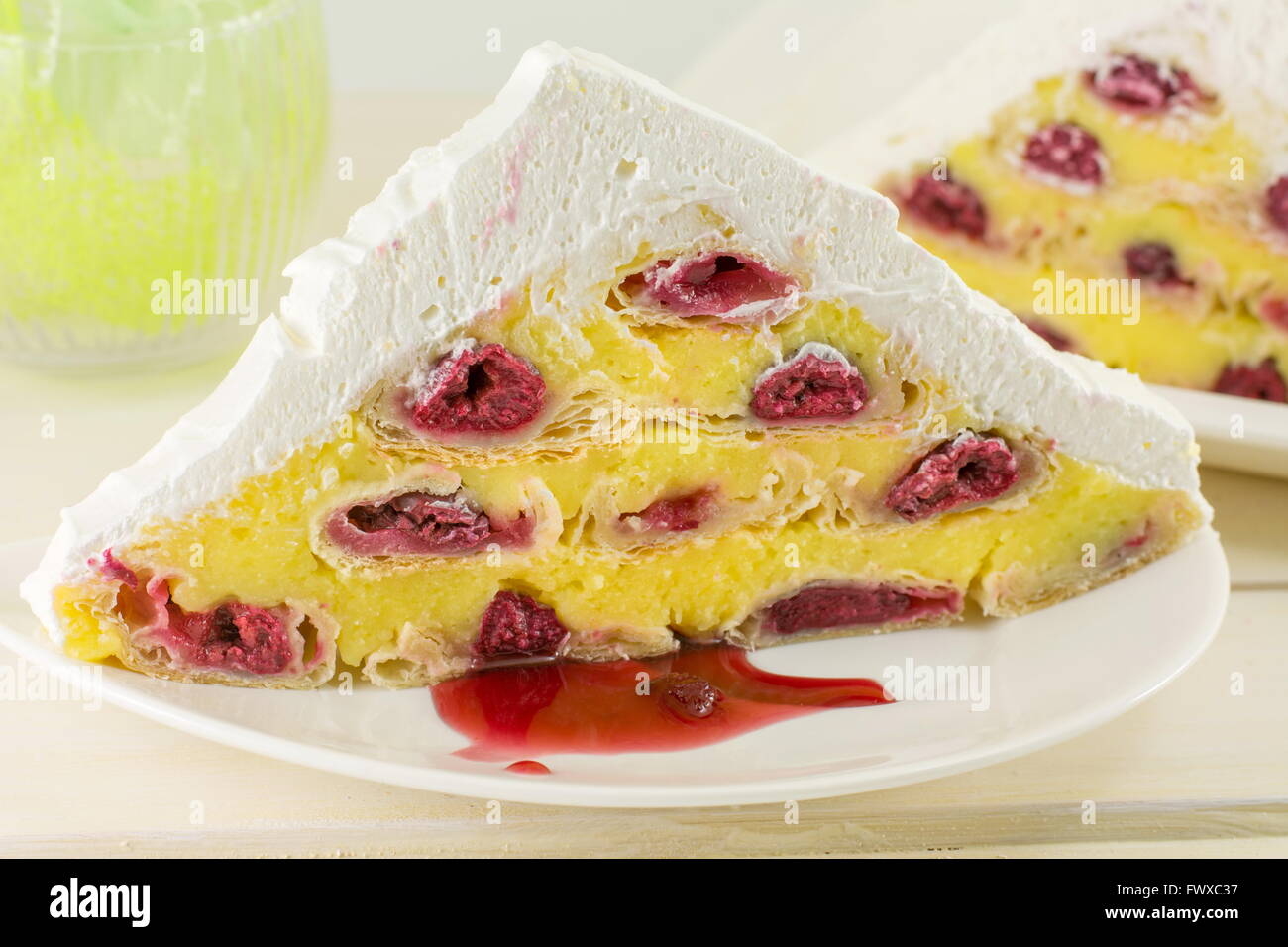 triangle cherry cake on white background Stock Photo - Alamy