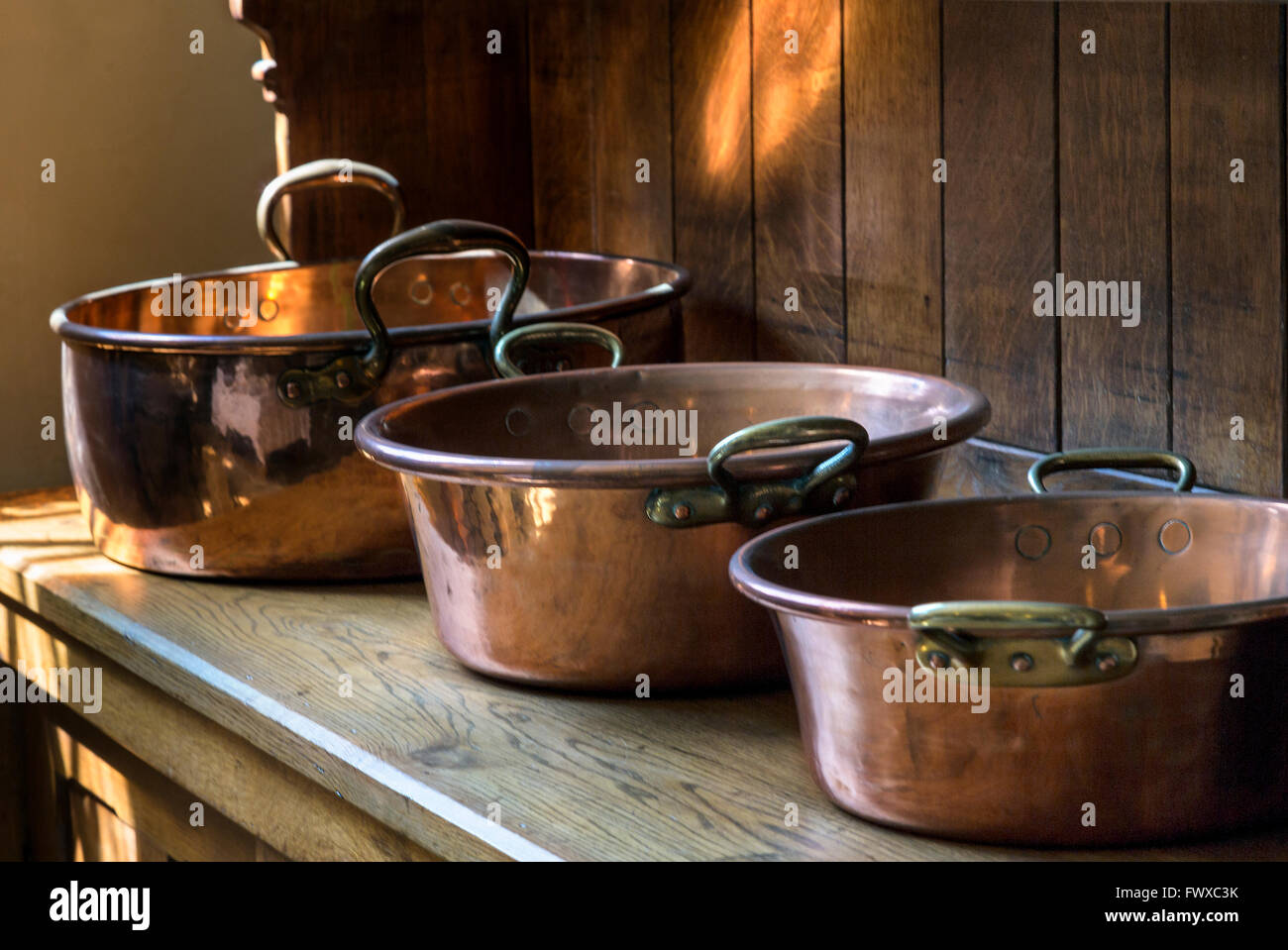 Some of the cooking kitchen utensils in Penrhyn Castle Stock Photo - Alamy