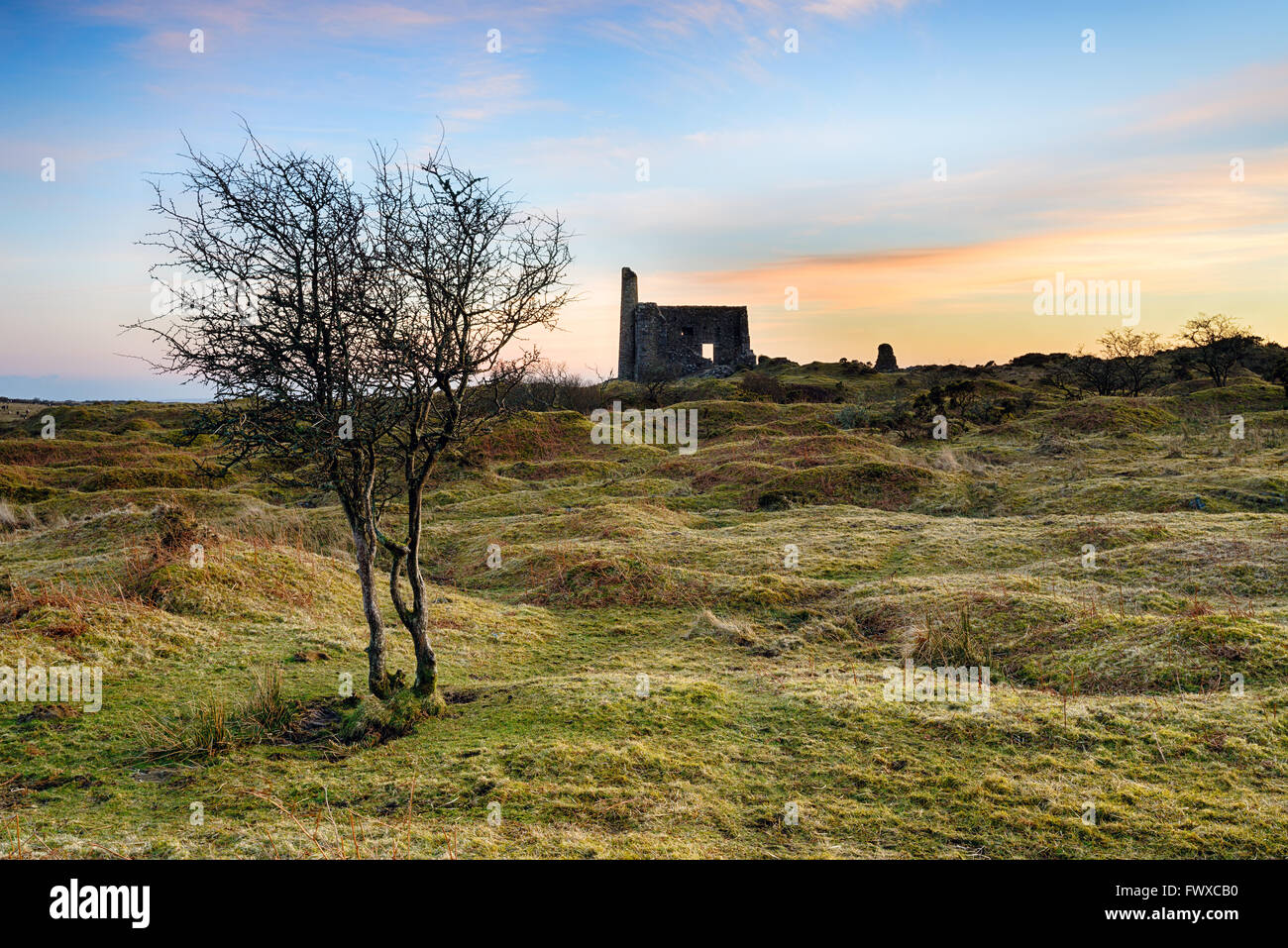Sunset over an old ruined engine house from the days of copper mining ...