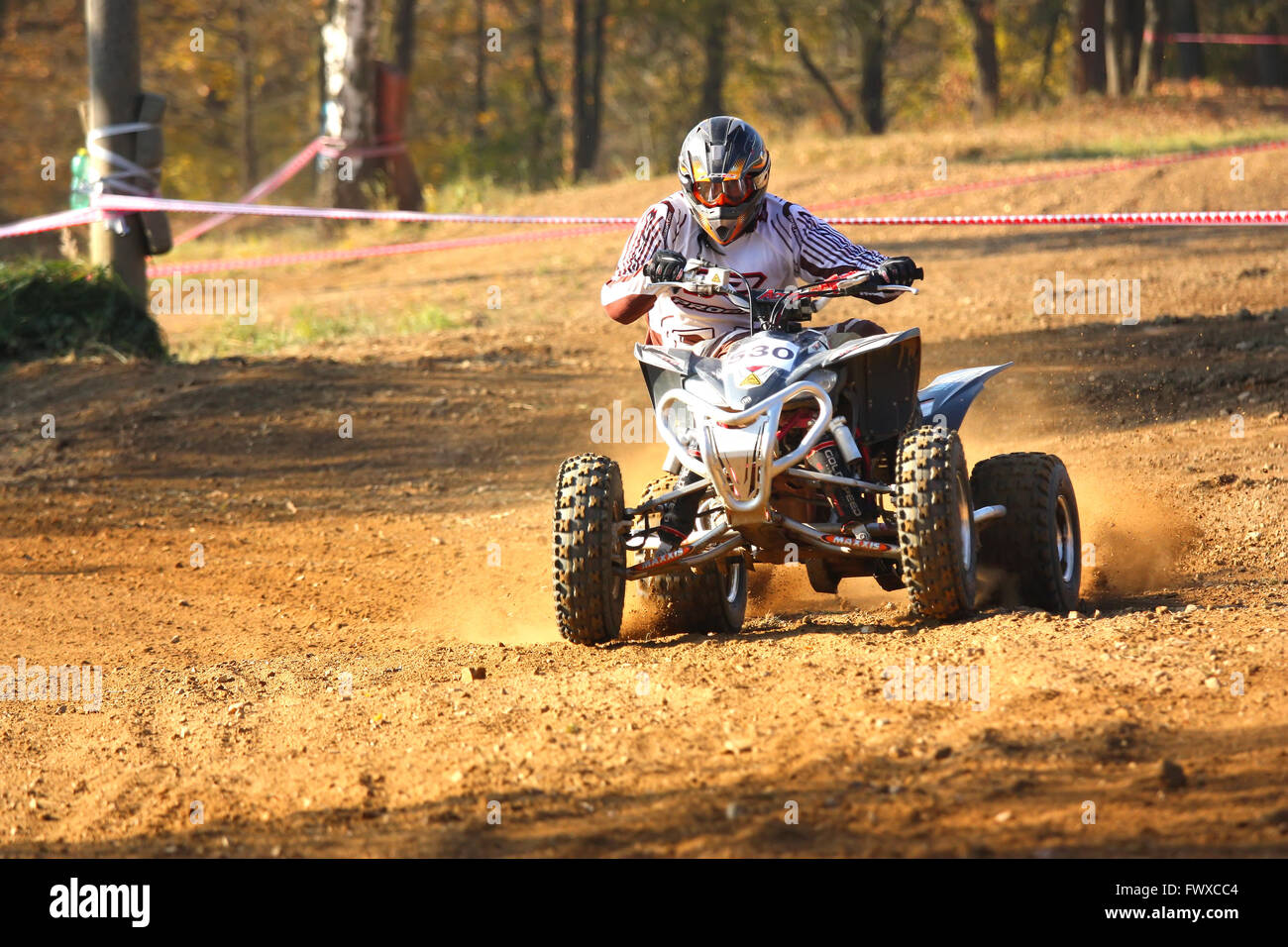 Quad racer is riding a quad motorbike Stock Photo - Alamy