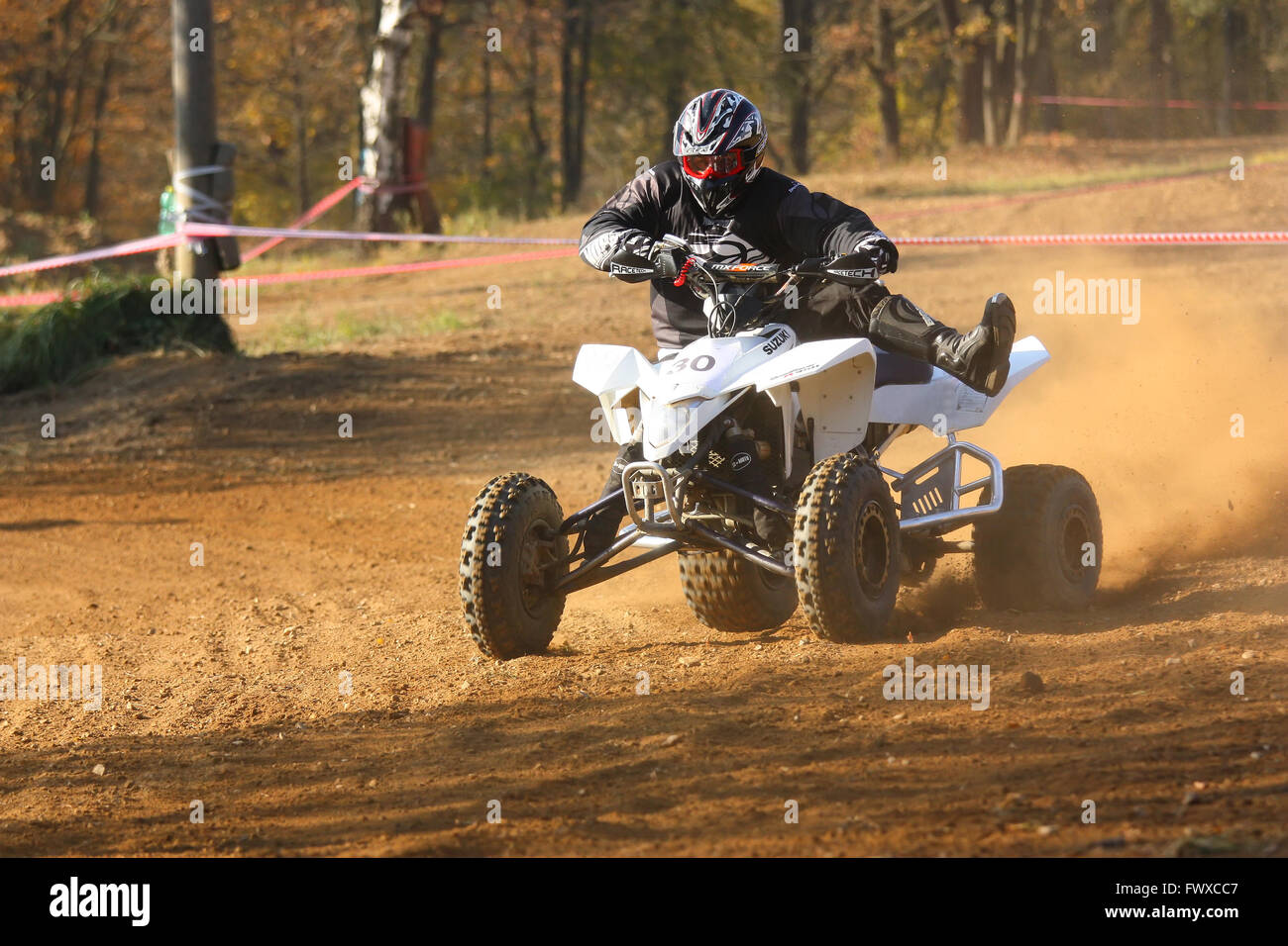 Quad racer is riding a quad motorbike in the turn Stock Photo - Alamy