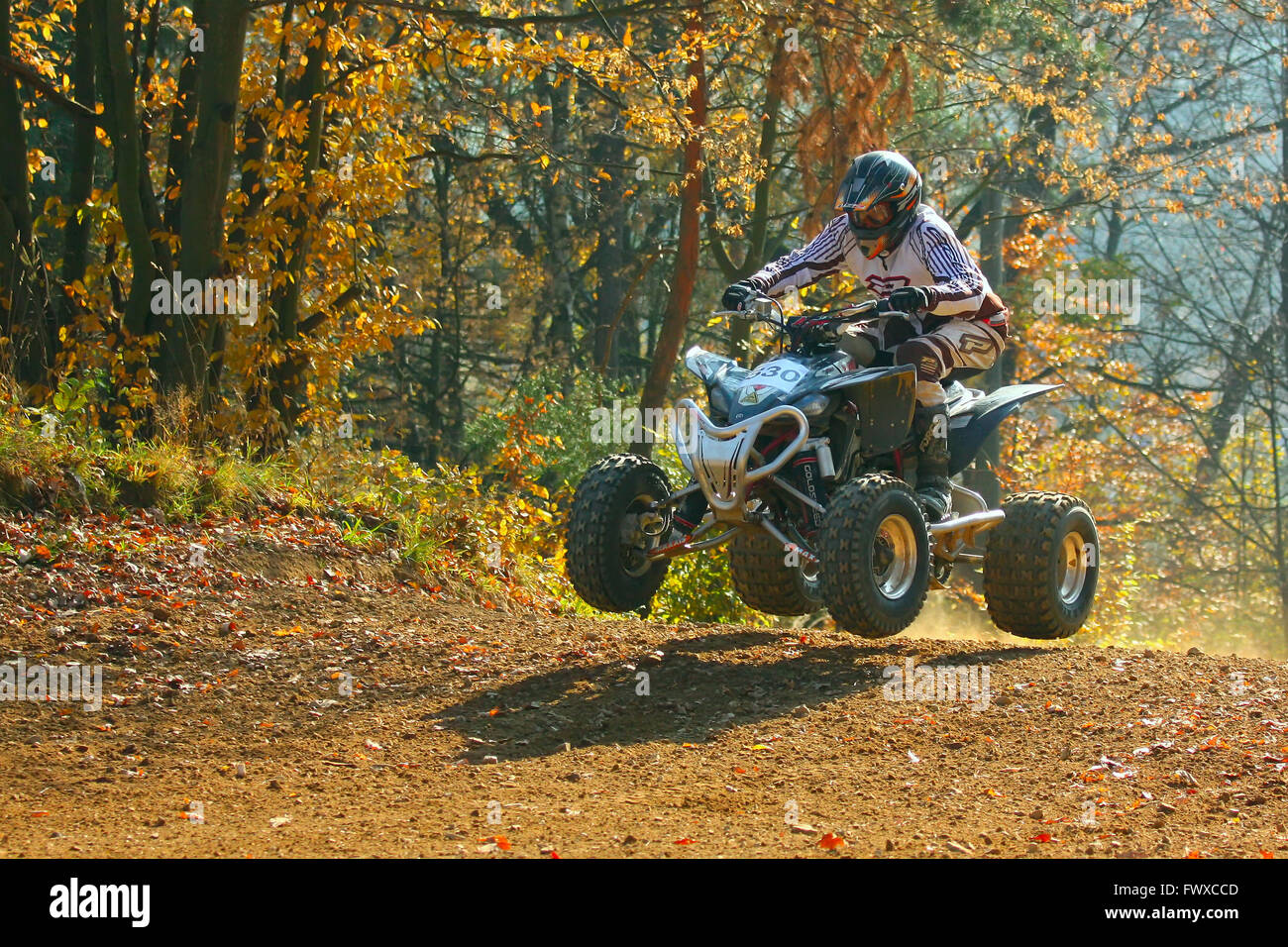 Quad racer is jumping Stock Photo - Alamy