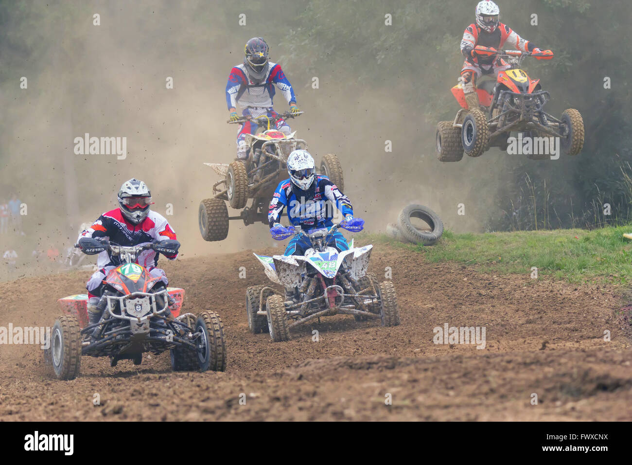 Group of racers are jumping a quad motorbikes in the race Stock Photo ...