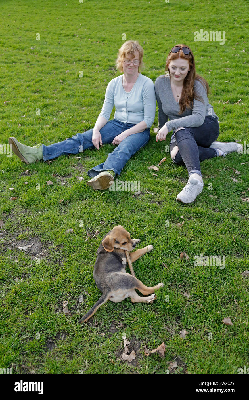 Woman daughter dog hi-res stock photography and images - Alamy
