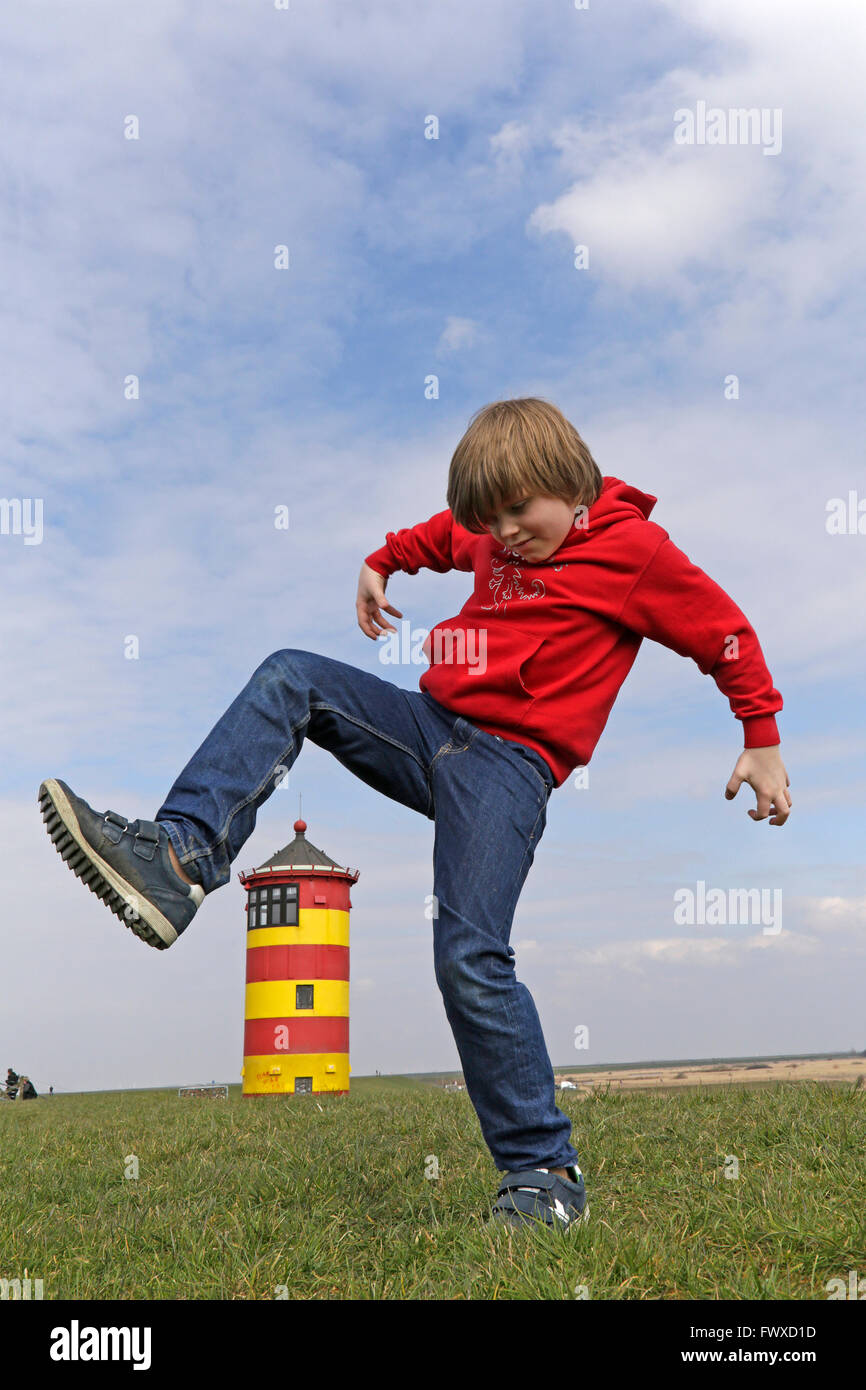 Pilsum lighthouse boy child step hi-res stock photography and images ...