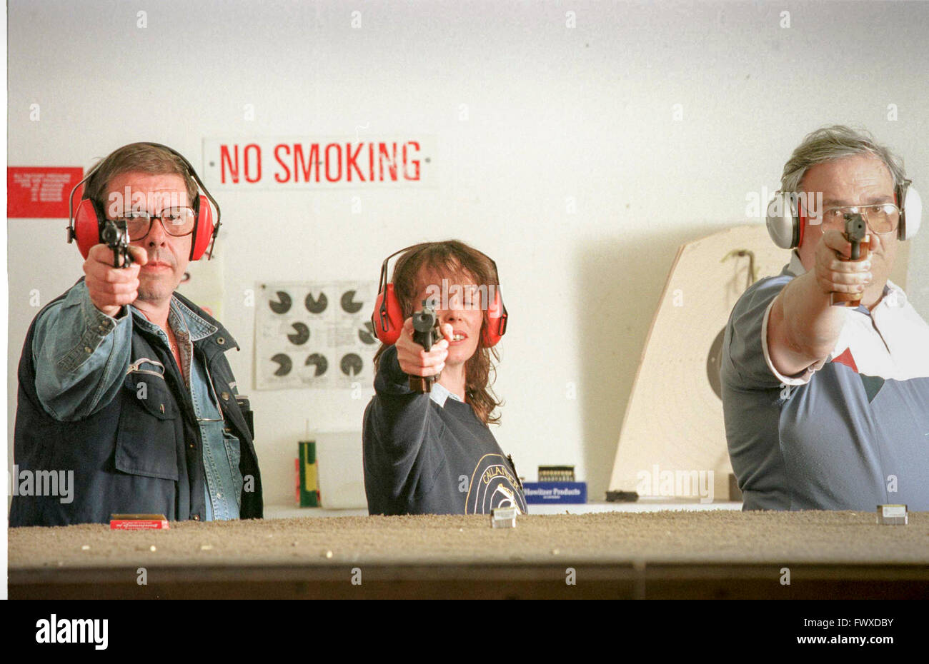 Members of a gun club practice on their indoor shooting range in Doune ...